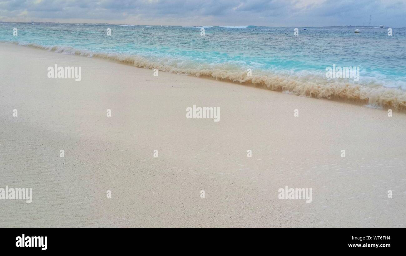 Water rushing on sand hi-res stock photography and images - Alamy