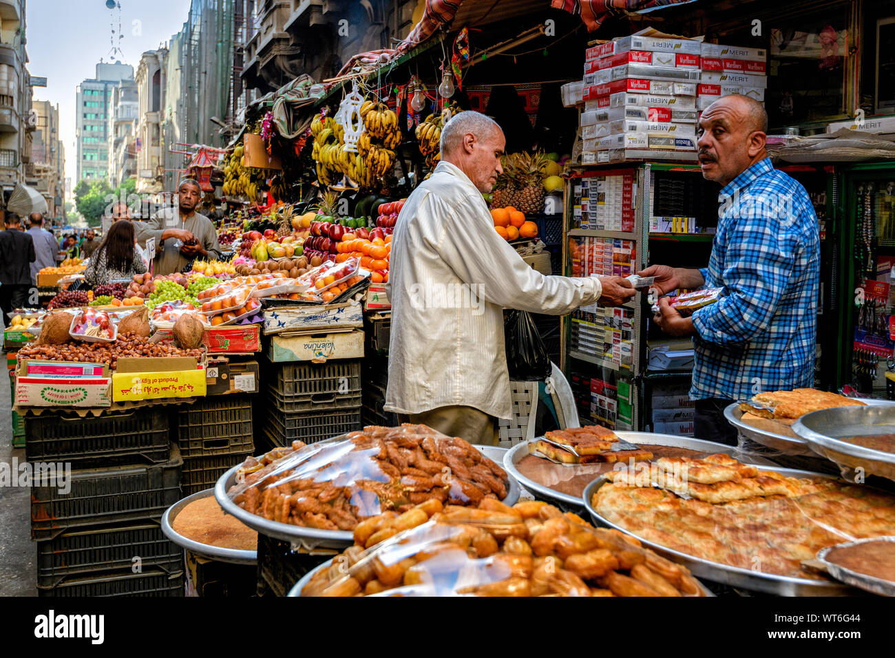 Vendors in El tawfikia market, a street market in the new part of ...