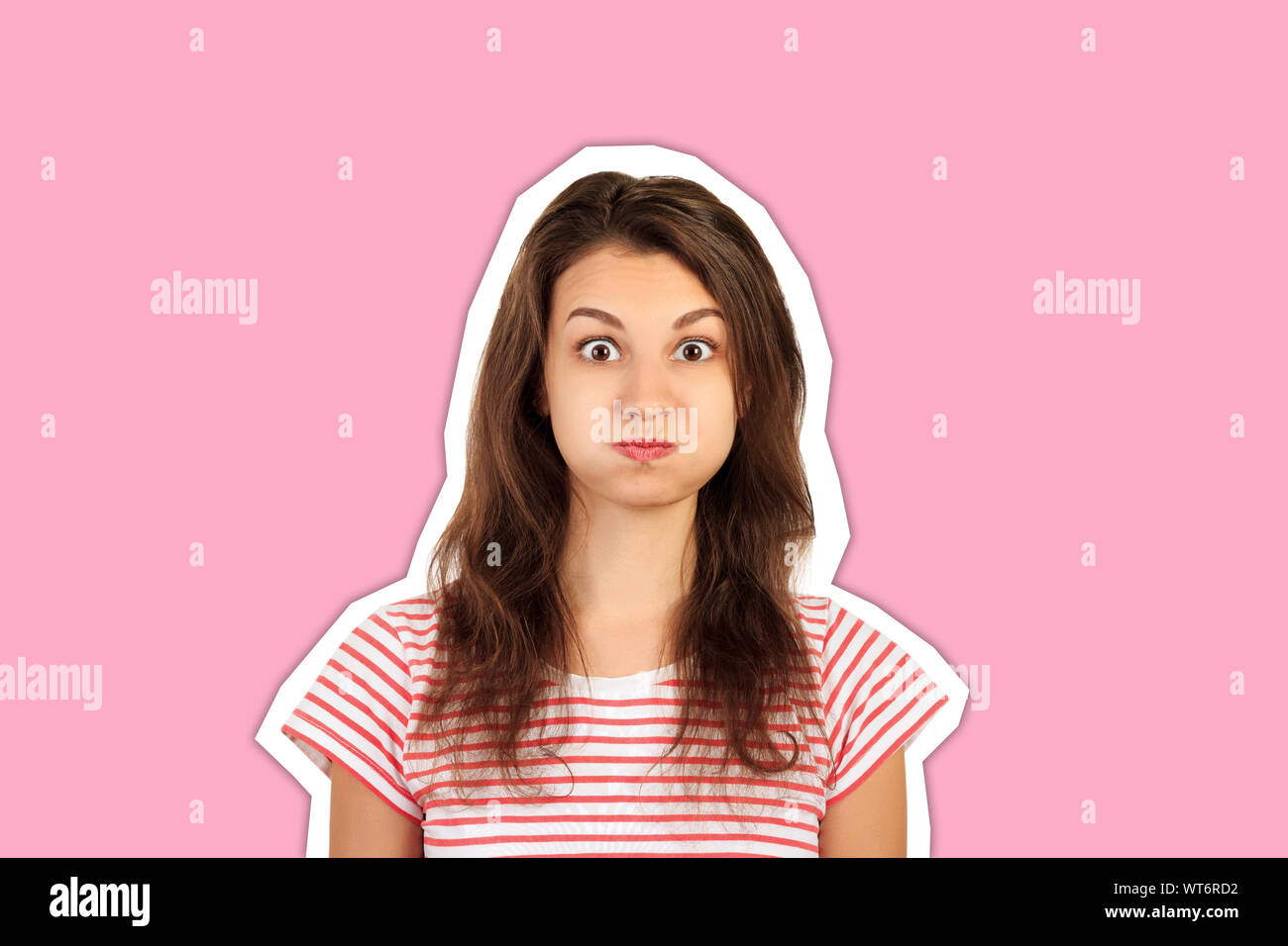 Funny and crazy pretty girl puffing out her cheeks. emotional girl ...