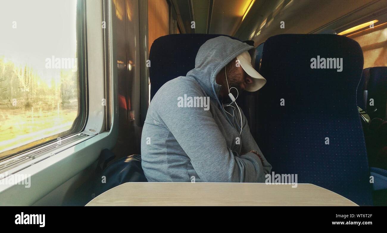 Sleeping train commuter hi-res stock photography and images - Alamy