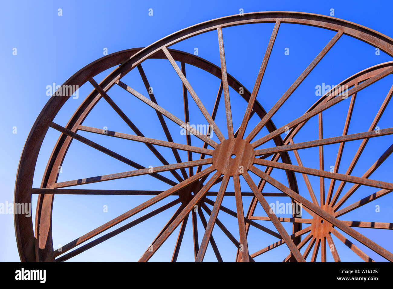 Artistic wheels made of metal Stock Photo - Alamy