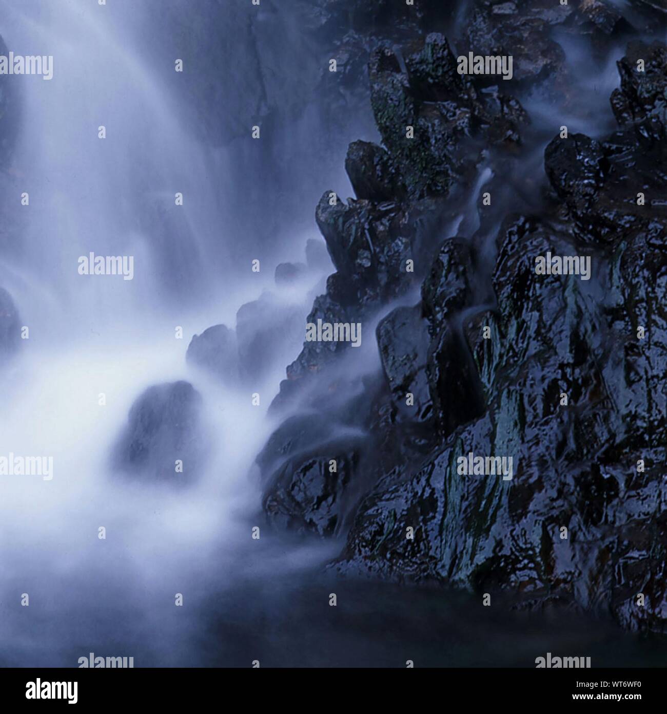 Water Falling Through Rocks Stock Photo - Alamy