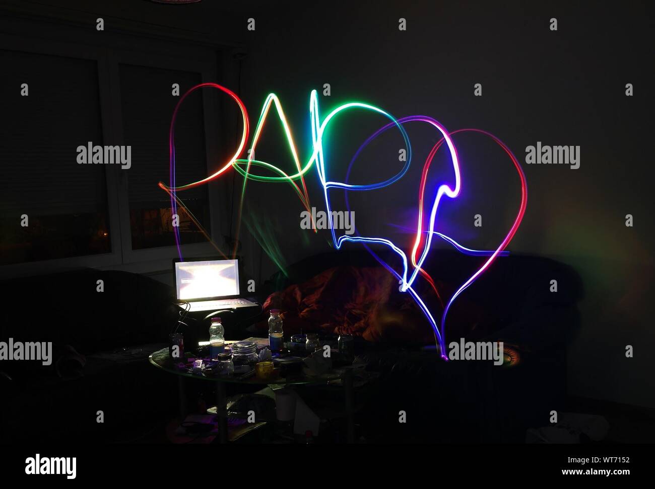 Laptop with glowing light hi-res stock photography and images - Alamy