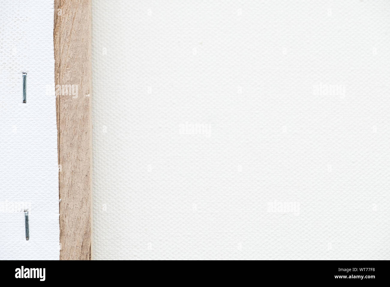 Backside of the wooden border on the canvas frame in the art studio ...