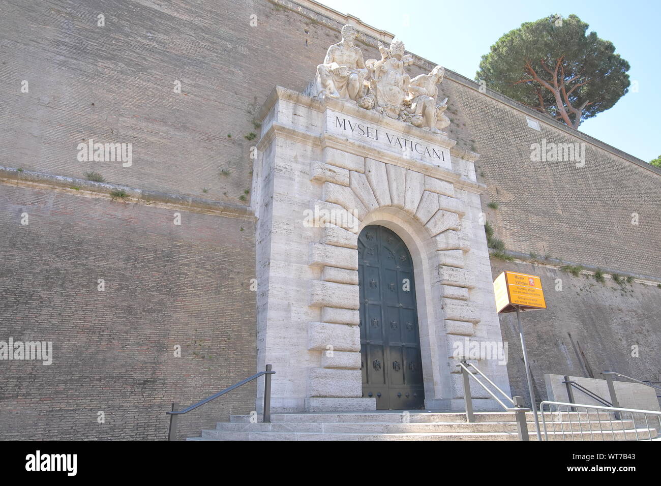 Vatican museum entrance gate Vatican city. Translation for Italian ...