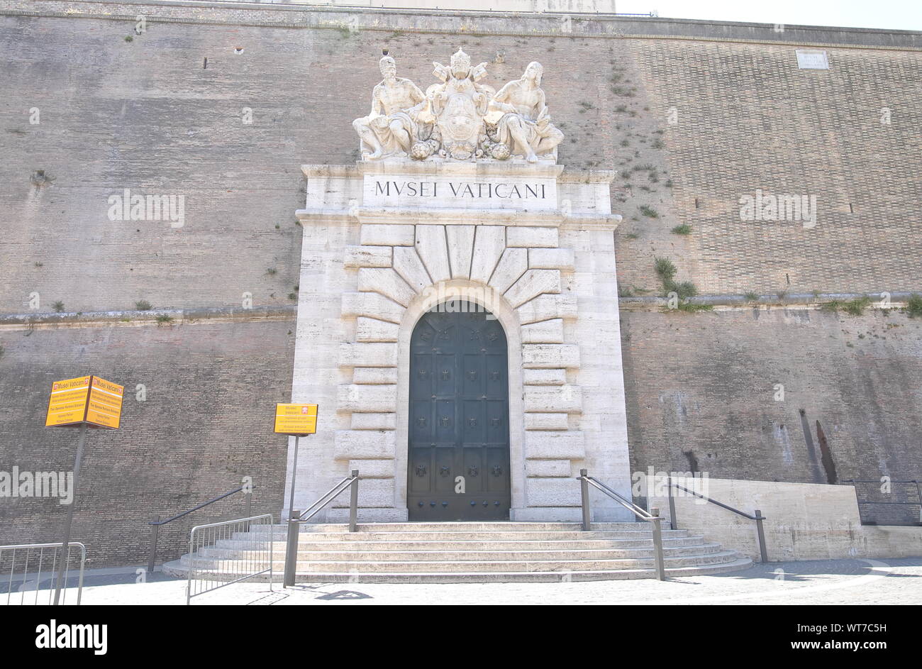Vatican museum entrance gate Vatican city. Translation for Italian ...