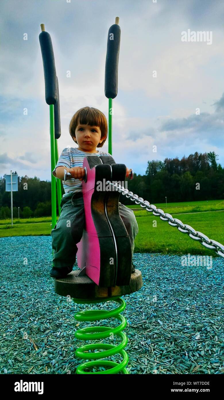 Horse spring playground hi-res stock photography and images - Alamy