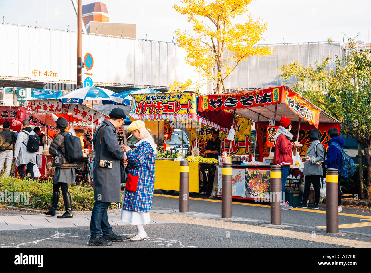 Tokyo, Japan - November 25, 2018 : Japanese street food stalls in front ...