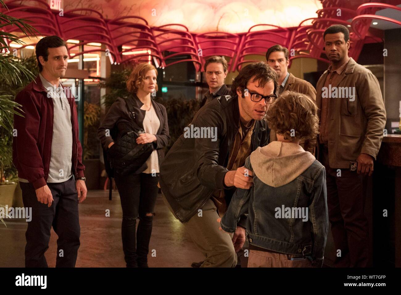 IT CHAPTER TWO, foreground from left: Bill Hader, Luke Roessler (back ...