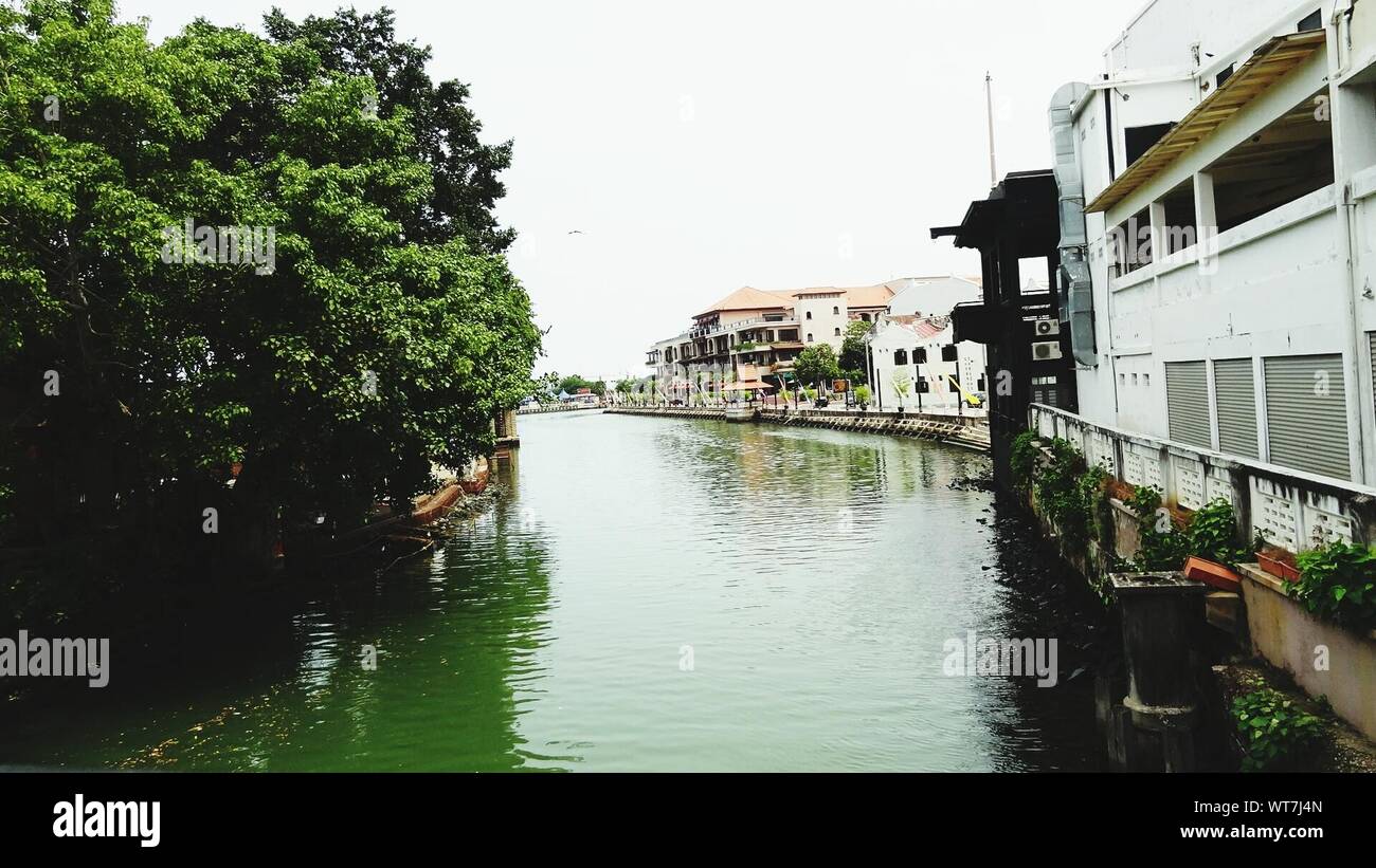 Buildings Along River Stock Photo - Alamy