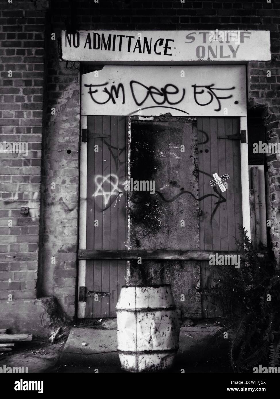 Graffiti On Old Factory Building High Resolution Stock Photography and ...