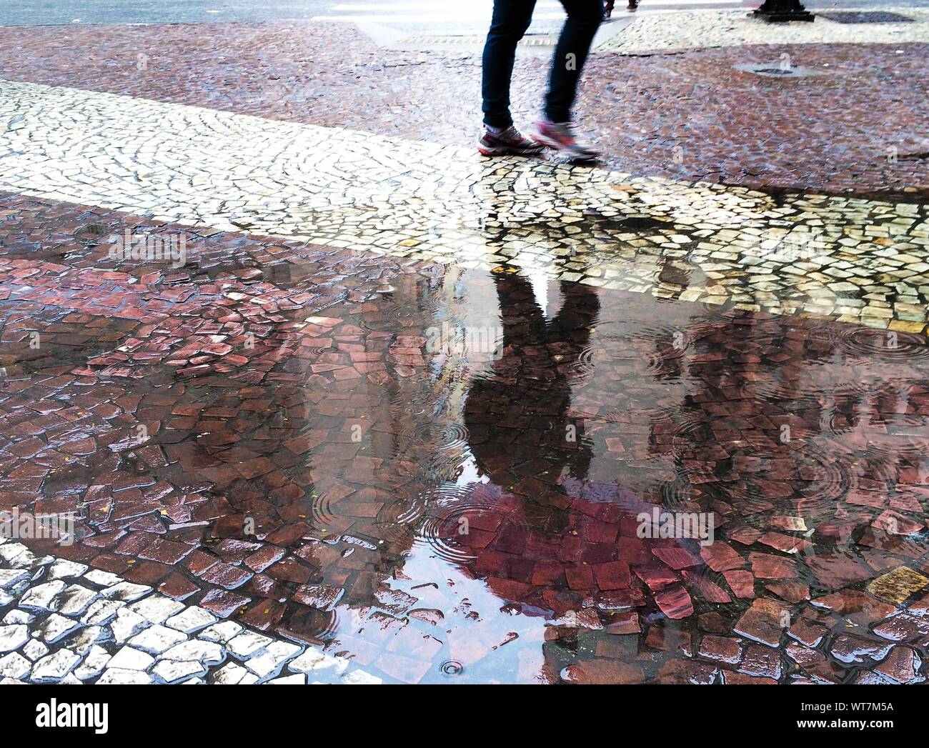 Man rain puddle hi-res stock photography and images - Alamy