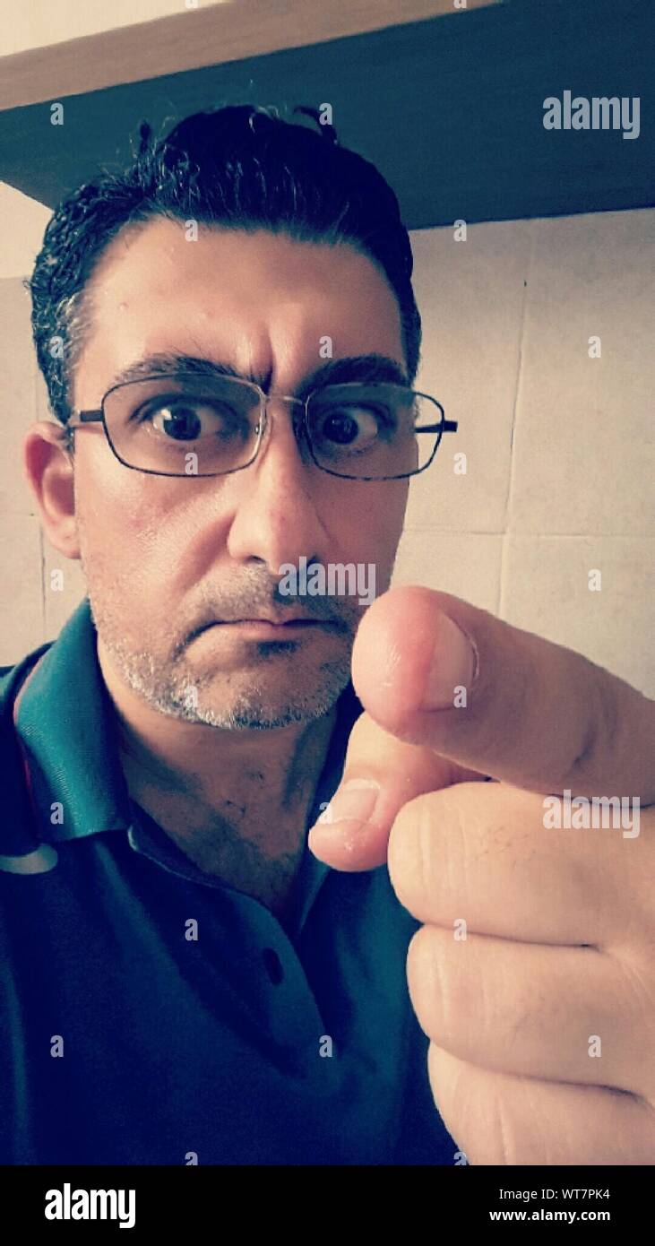 Finger pointing up man hi-res stock photography and images - Alamy