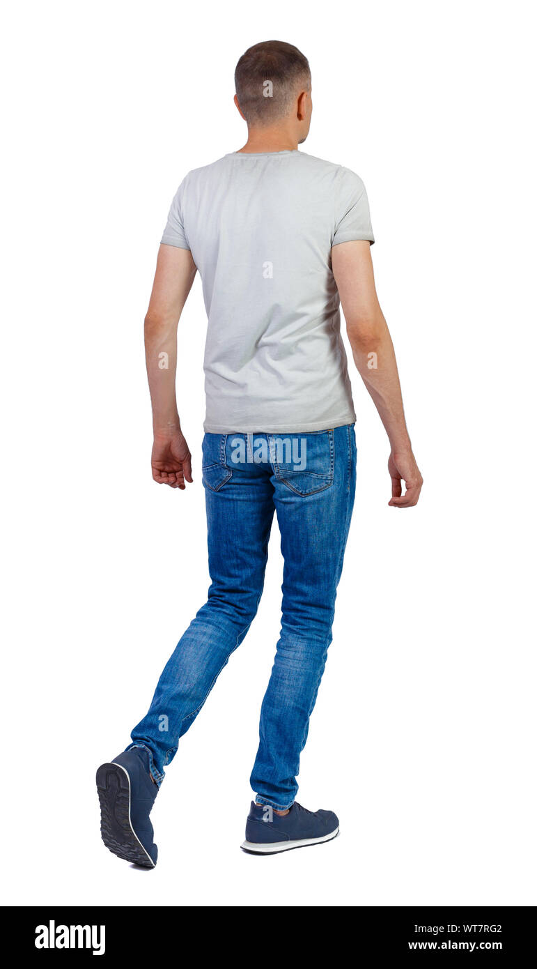 Back view of going handsome man . walking young guy . Rear view people ...