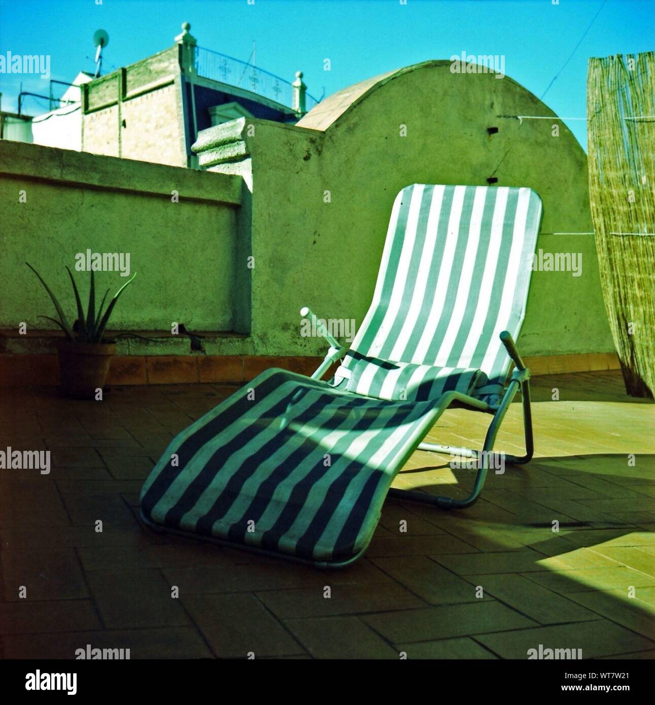 Chair on terrace hi-res stock photography and images - Alamy