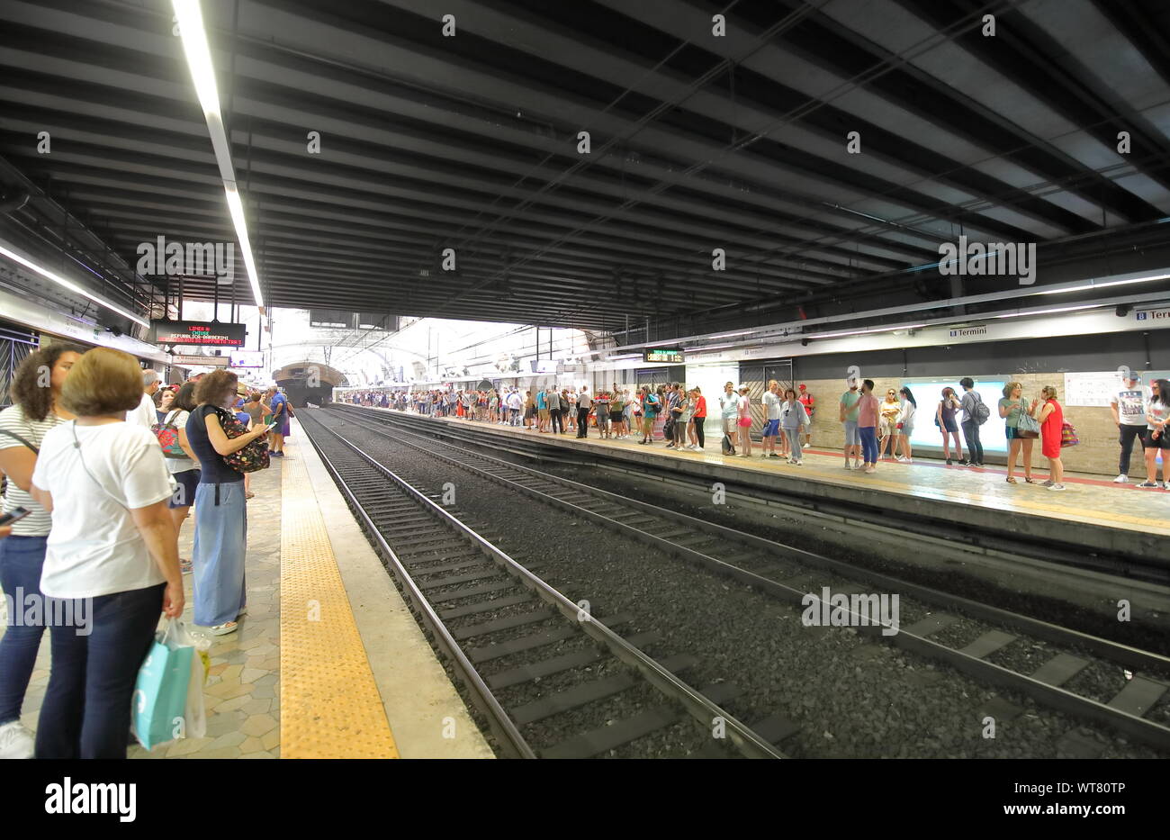 People travel by metro subway in downtown Rome Italy Stock Photo - Alamy