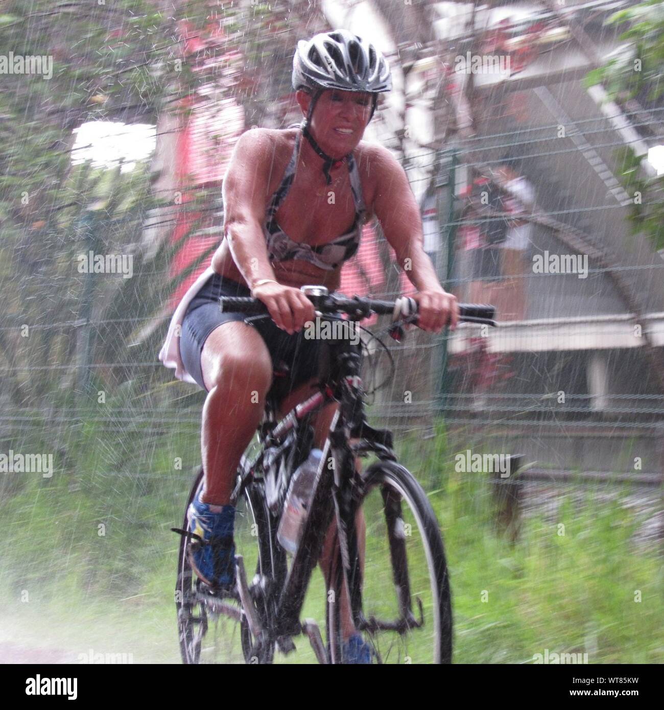 Rain riding hi-res stock photography and images - Alamy