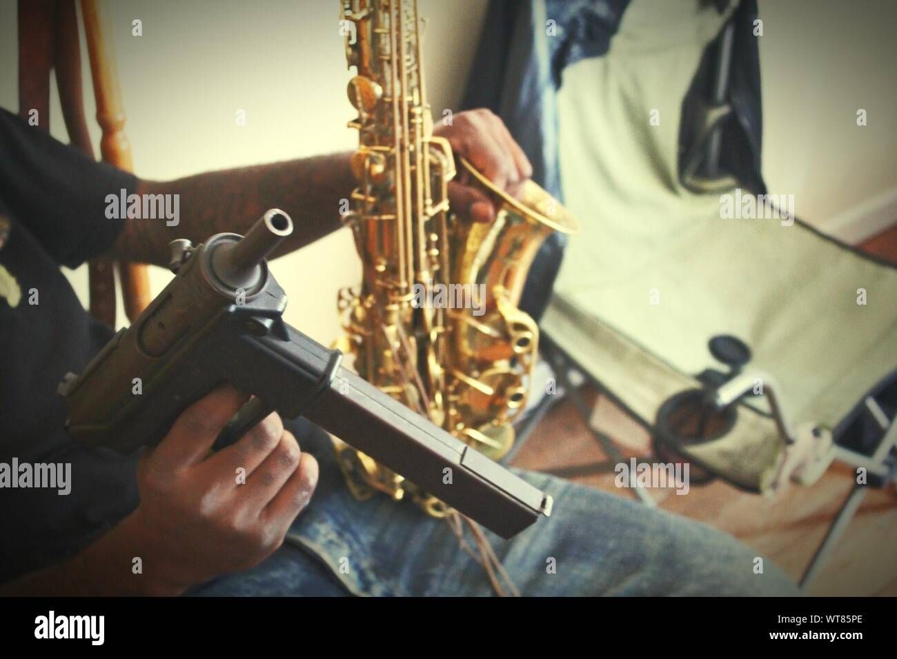 Man Holding Saxophone High Resolution Stock Photography and Images - Alamy