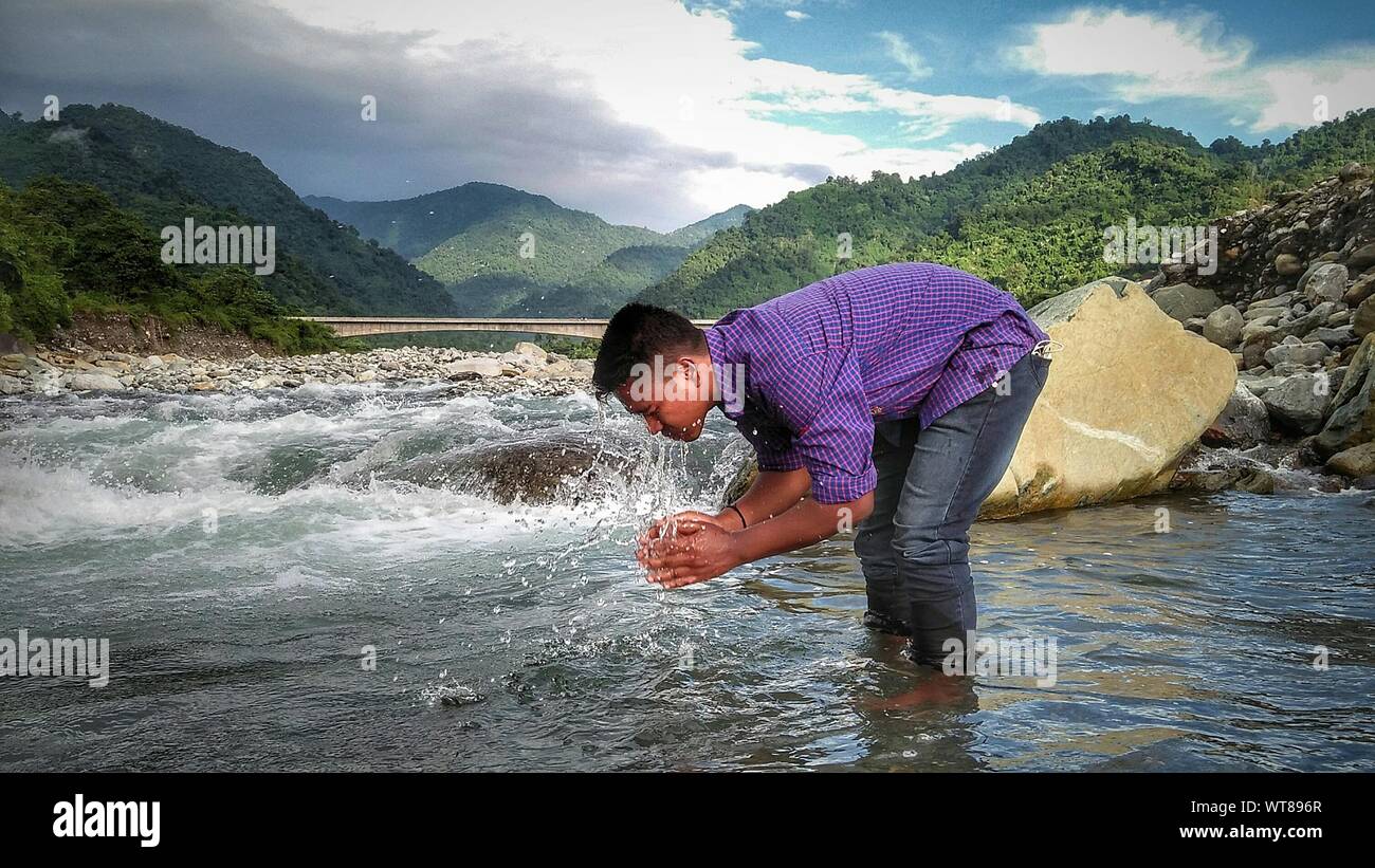 Indian Man Washing Outdoors High Resolution Stock Photography and ...