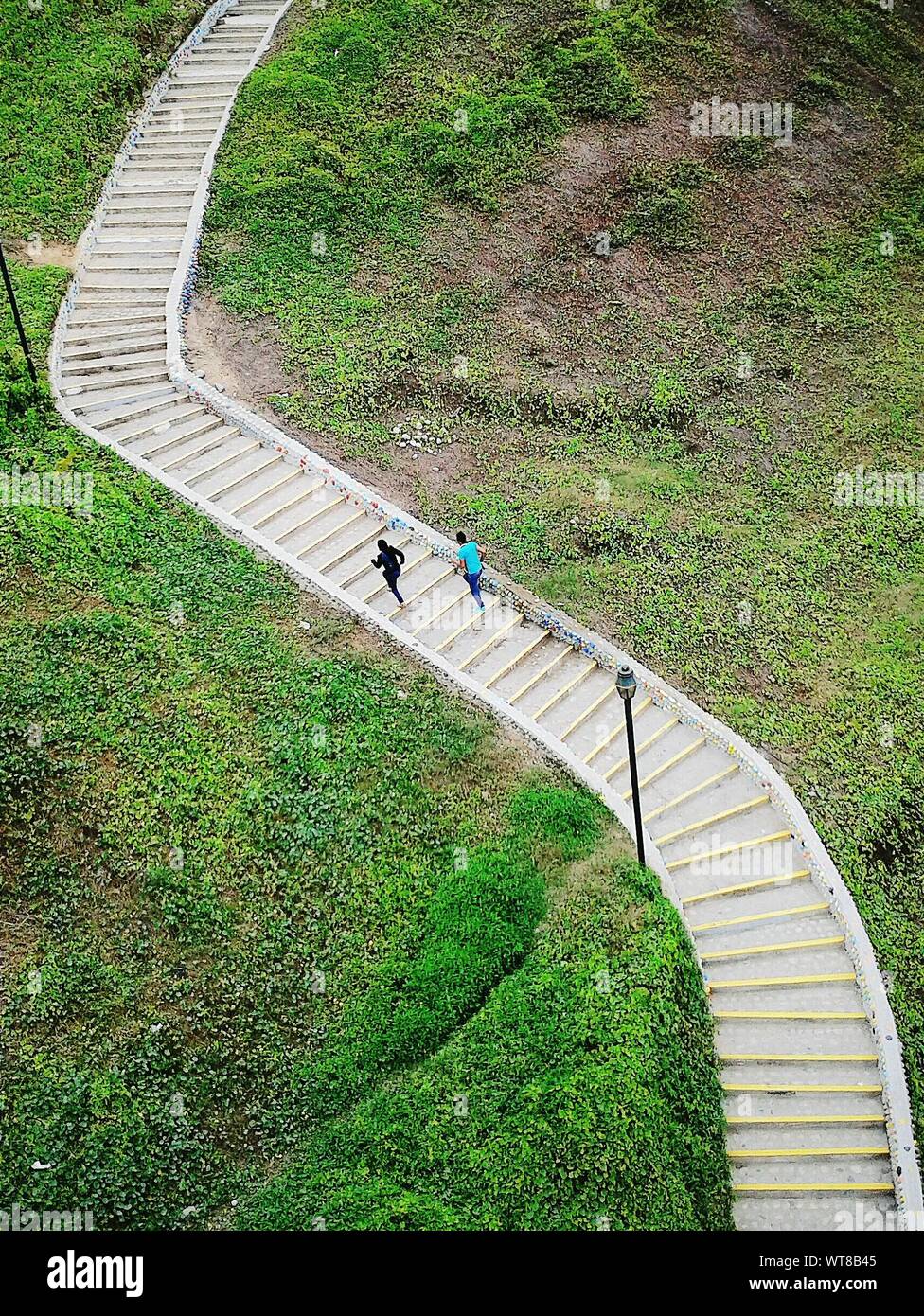 People climbing stairs hi-res stock photography and images - Alamy