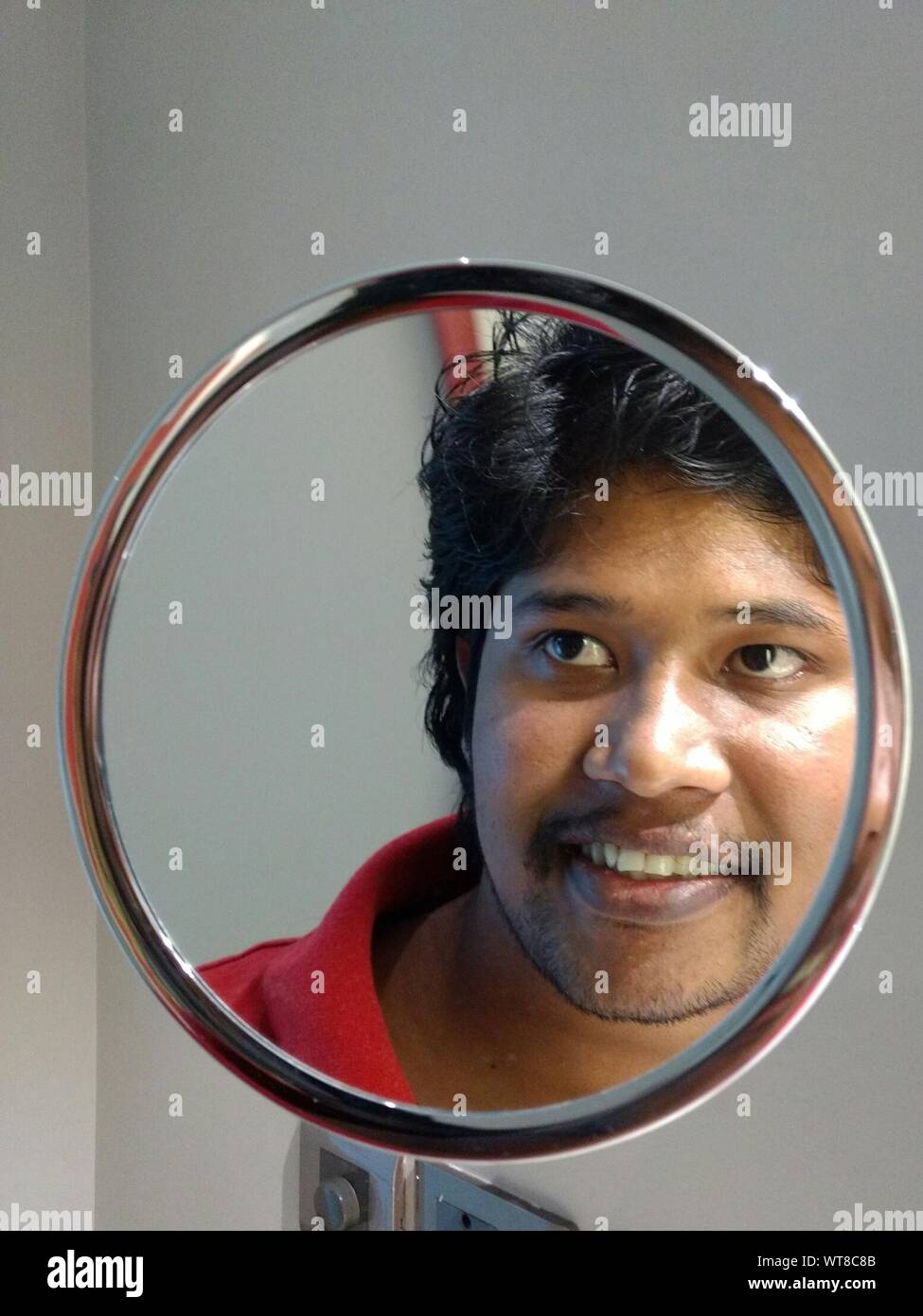 Mirror reflection smiling hi-res stock photography and images - Alamy