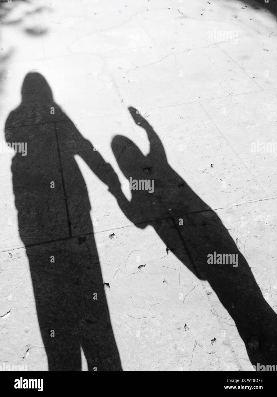 Two person raised hands hi-res stock photography and images - Alamy