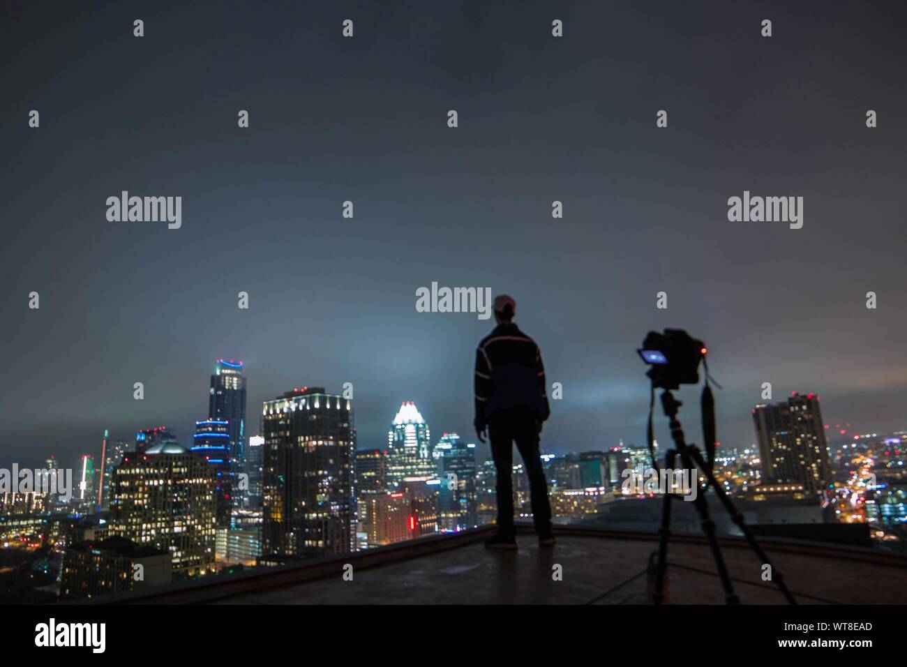 Person overlooking cityscape hi-res stock photography and images - Alamy