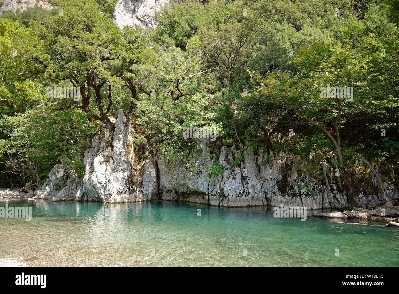 The Voidomatis river in Northern Greece. Travel between the road from ...