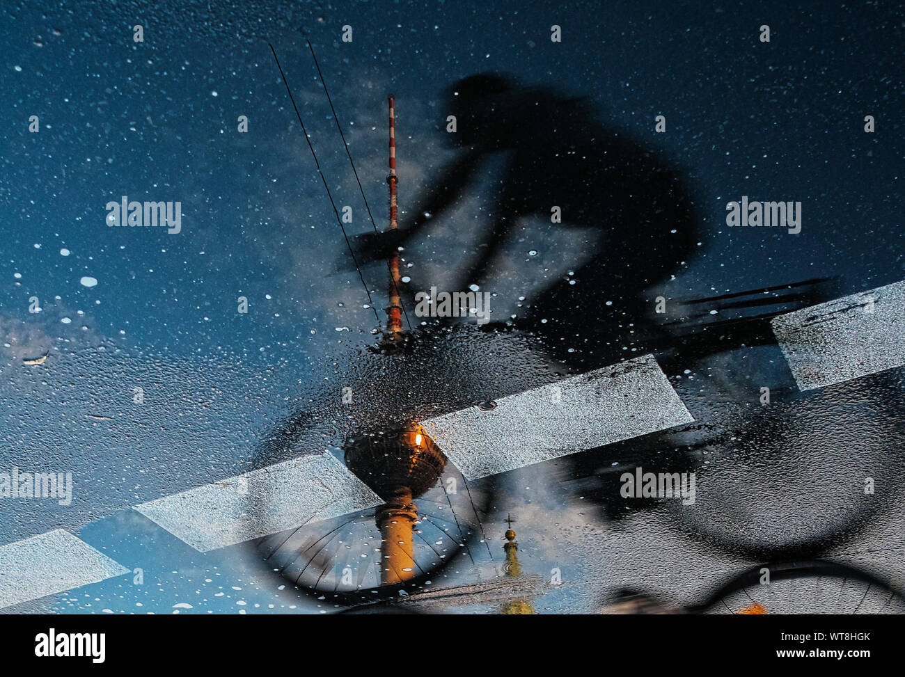 Reflection woman puddle city hi-res stock photography and images - Alamy