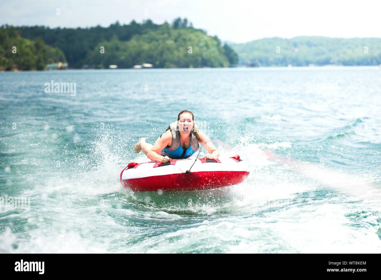 Woman In Inflatable Raft On High Resolution Stock Photography and ...