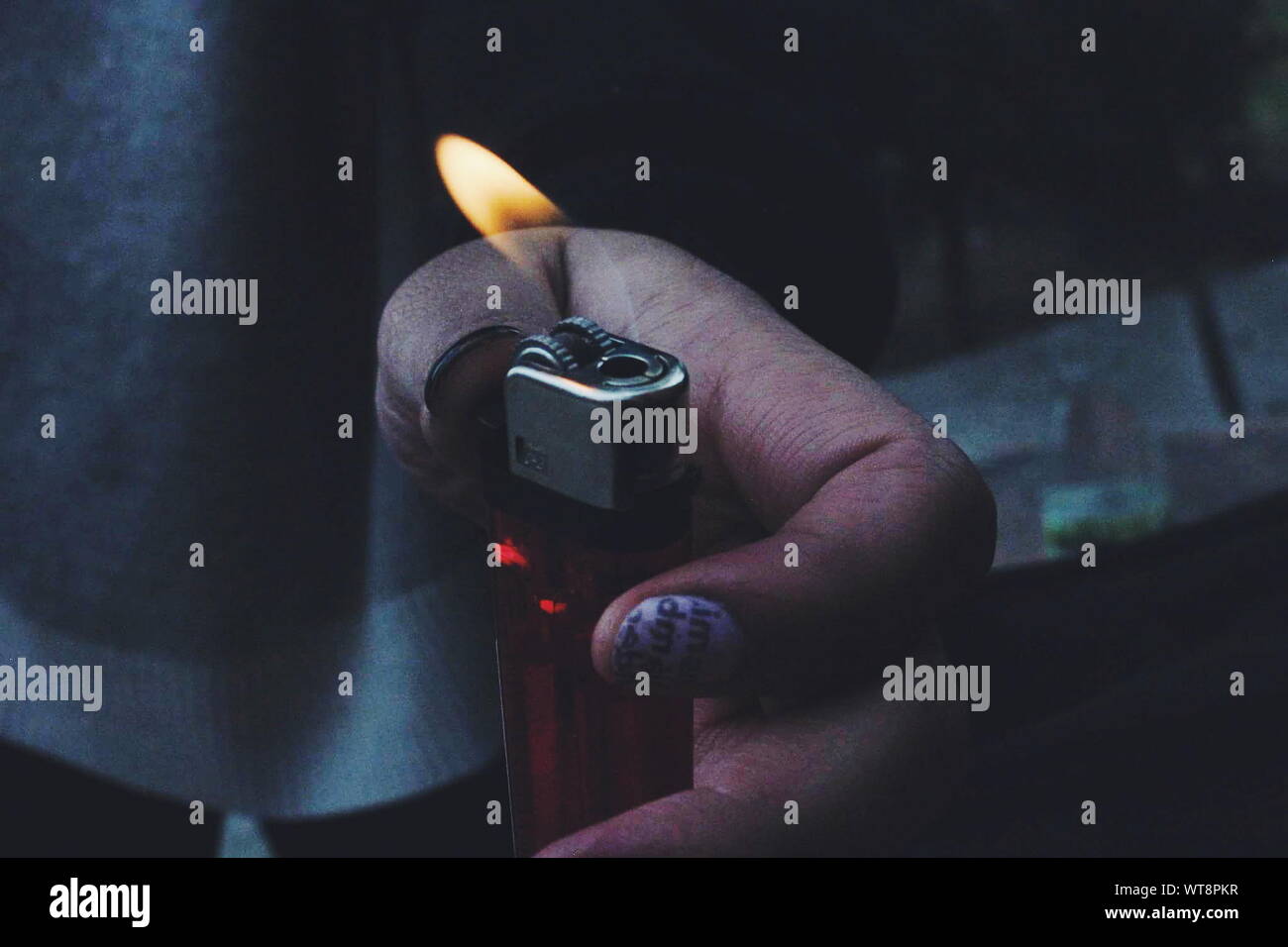 Hand Holding Lighter High Resolution Stock Photography and Images - Alamy