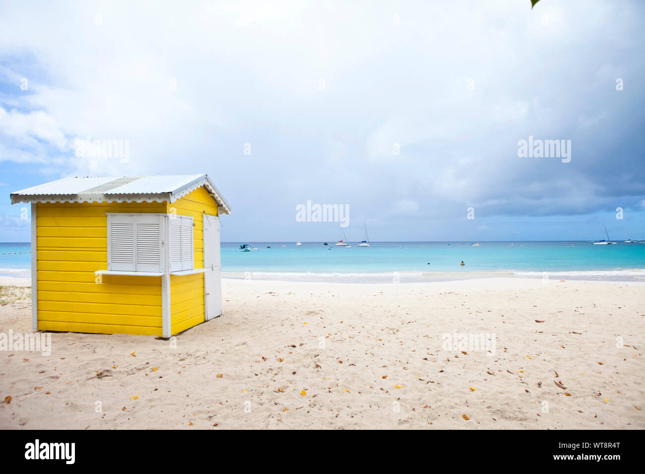 Yellow beach hut hi-res stock photography and images - Alamy