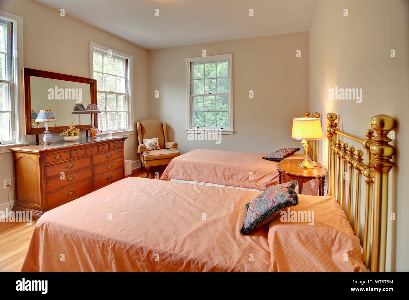 traditional bedroom interior with two beds Stock Photo - Alamy