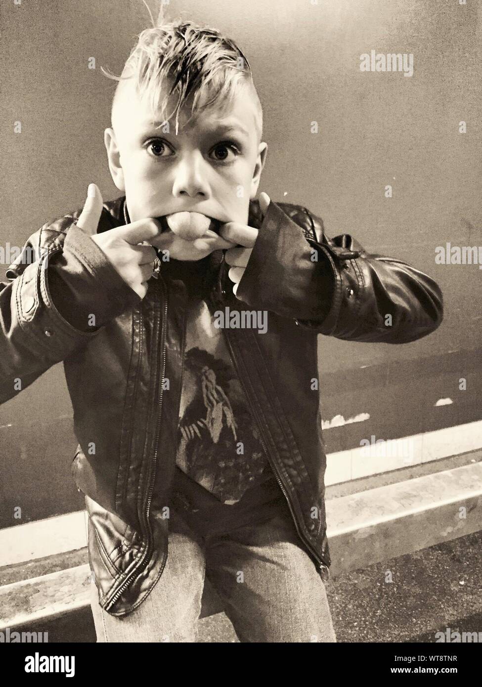 Teasing boy hi-res stock photography and images - Alamy