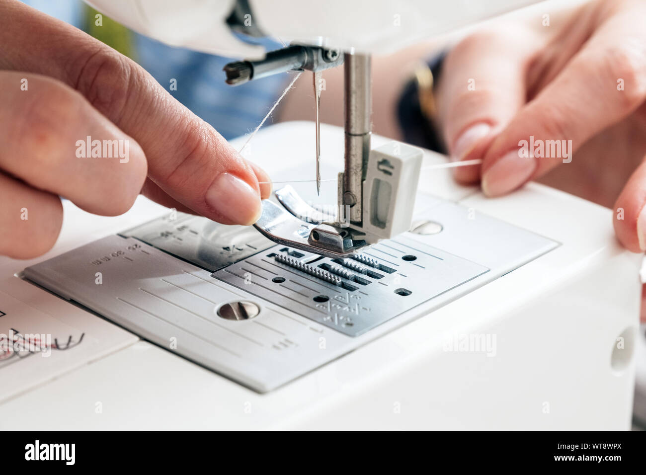 How to thread a sewing machine hi-res stock photography and images - Alamy