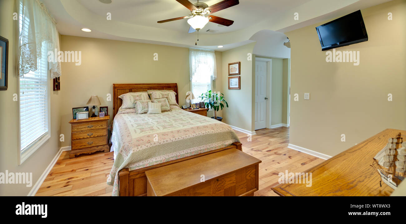 wide view of master bedroom suite Stock Photo - Alamy