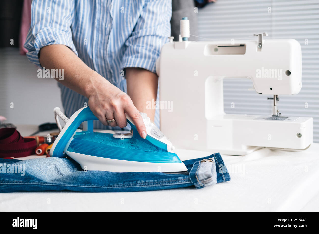 Professional ironing hi-res stock photography and images - Alamy