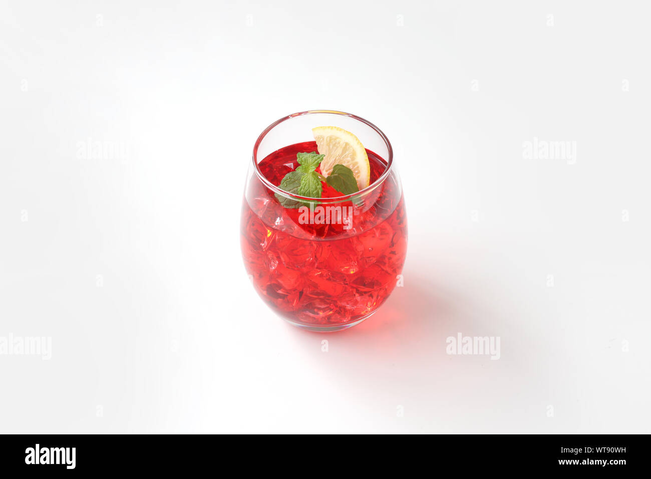 glass of cold tea red drink closeup isolated on white background Stock ...
