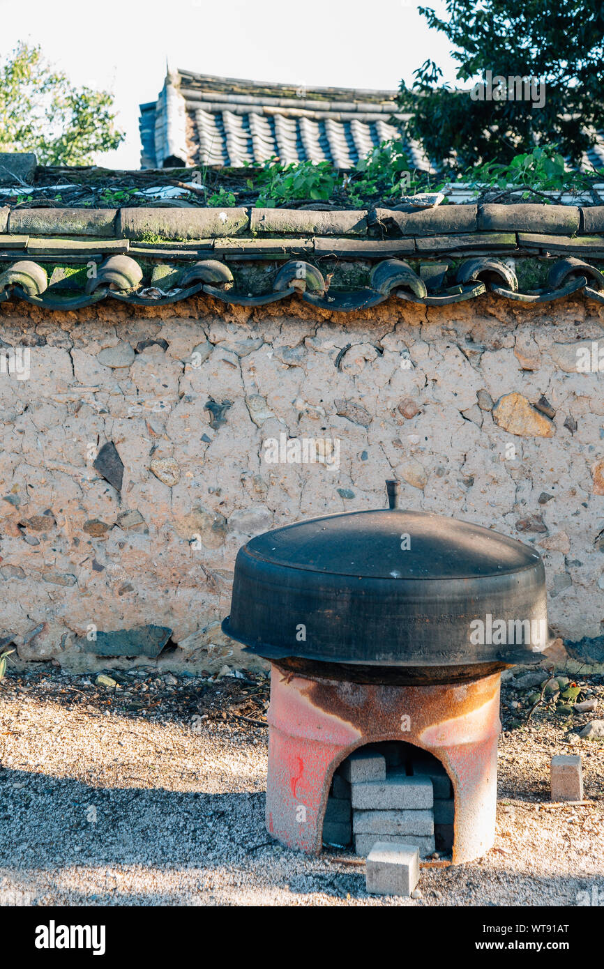 Iron pot and Korean traditional fireplace at Gyochon Hanok Village in ...
