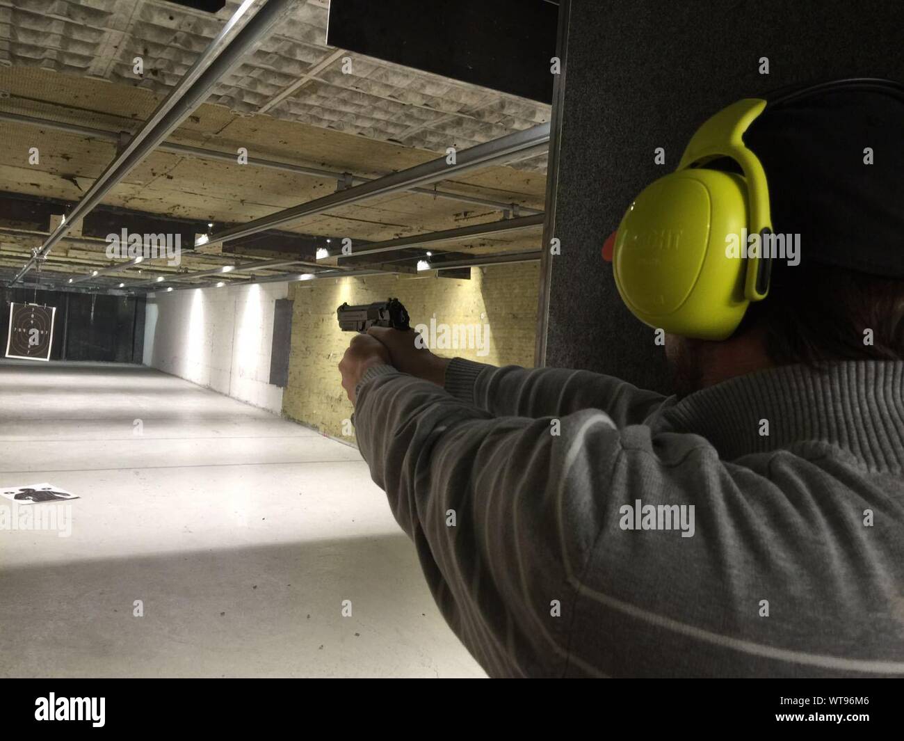 Man Aiming A Gun High Resolution Stock Photography and Images - Alamy