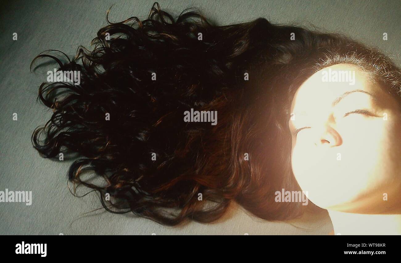 Woman face close up lying hi-res stock photography and images - Alamy