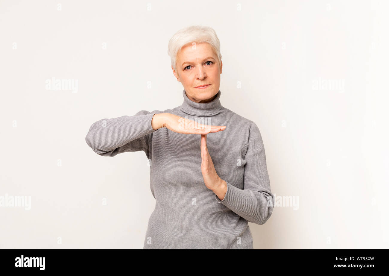 Stop sign woman senior hi-res stock photography and images - Alamy