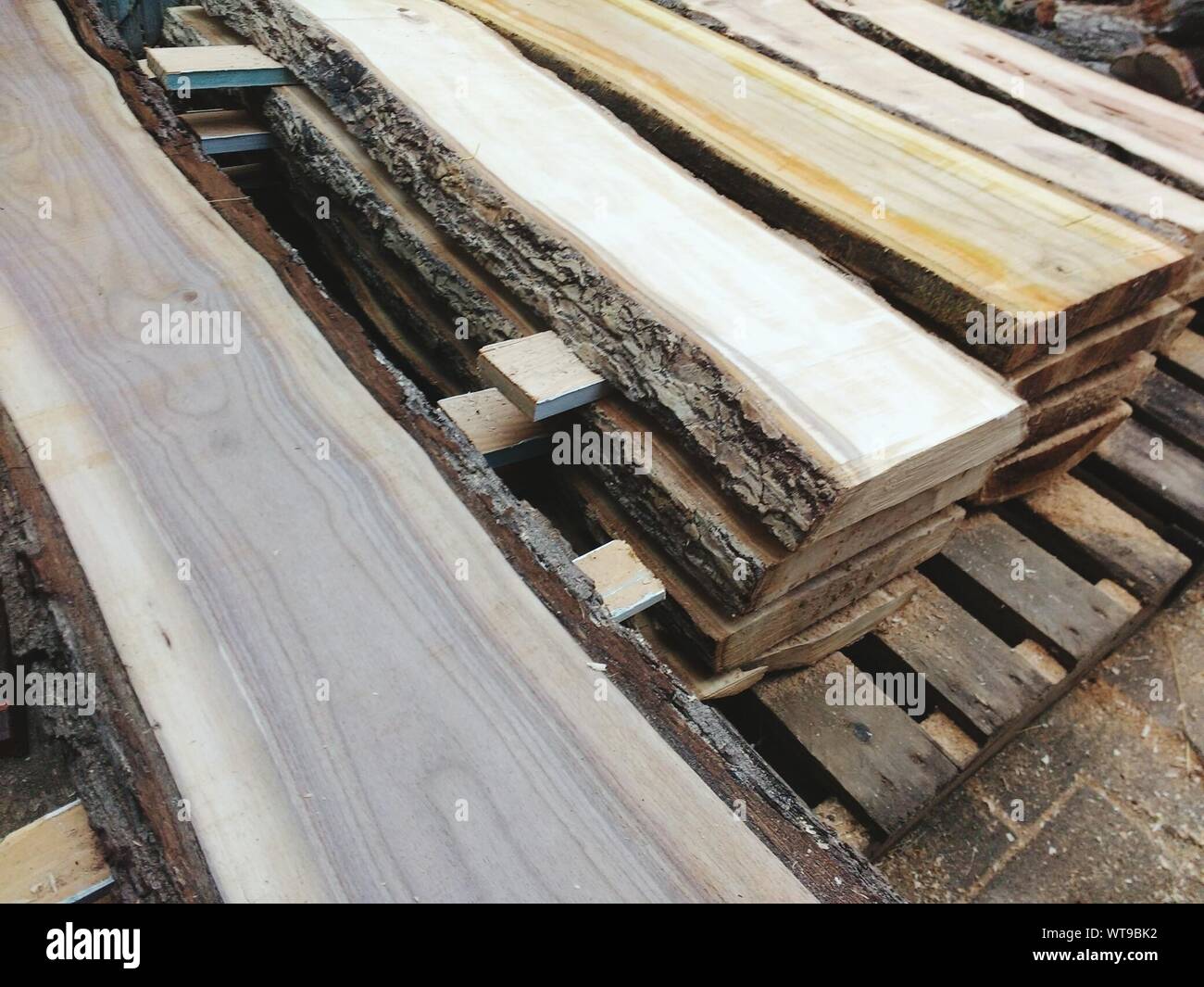 High Angle View Of Stacked Wooden Slabs Stock Photo - Alamy