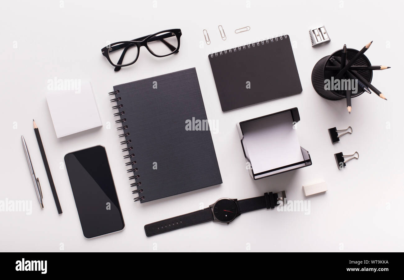 Modern workplace with modern office stationery on white Stock Photo - Alamy