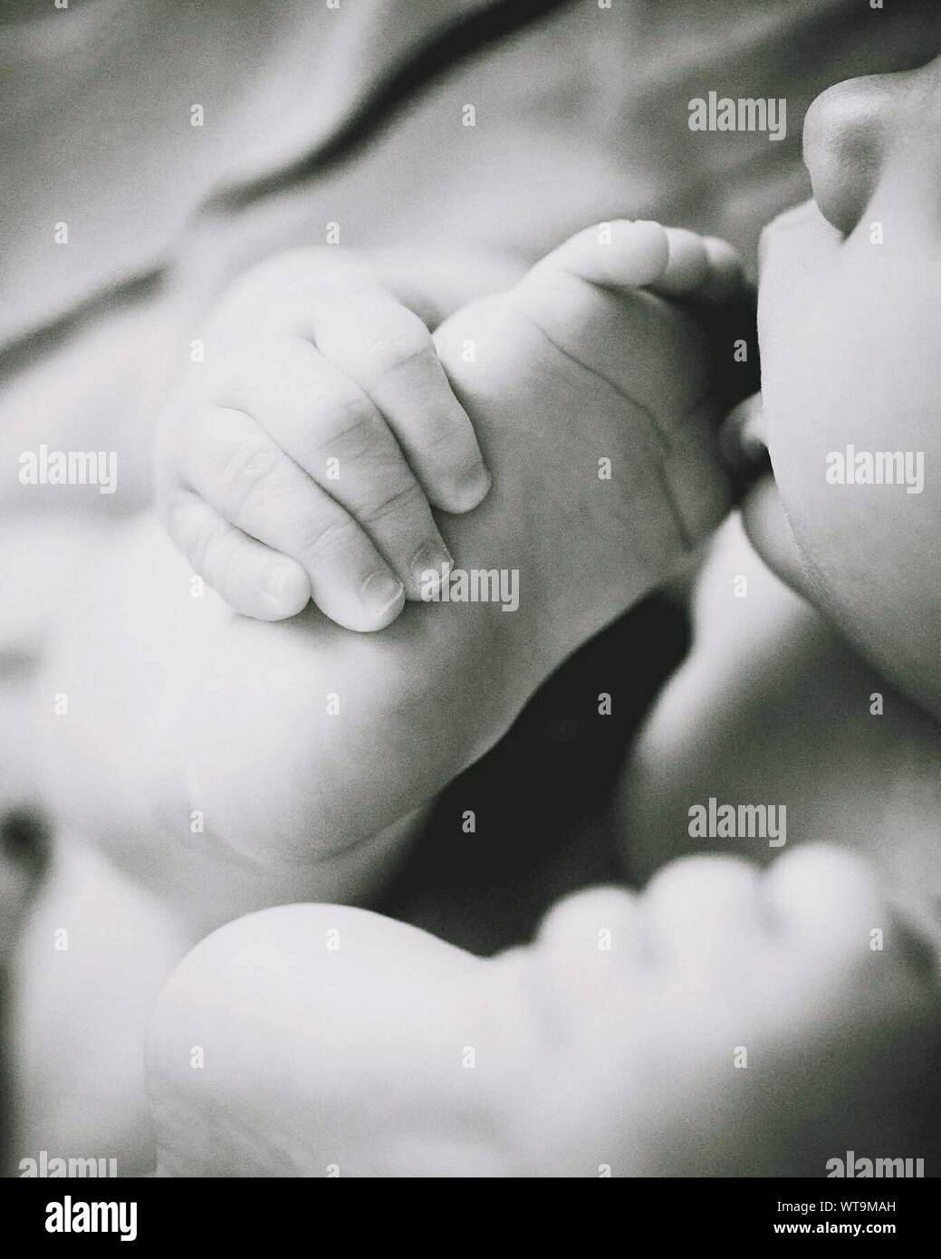 Girl chewing her toe hi-res stock photography and images - Alamy