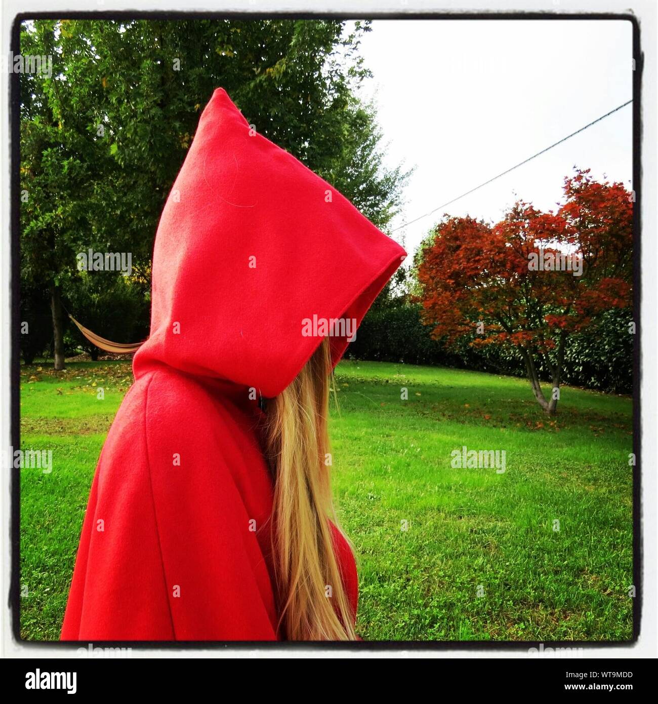 Long hooded cape hi-res stock photography and images - Alamy