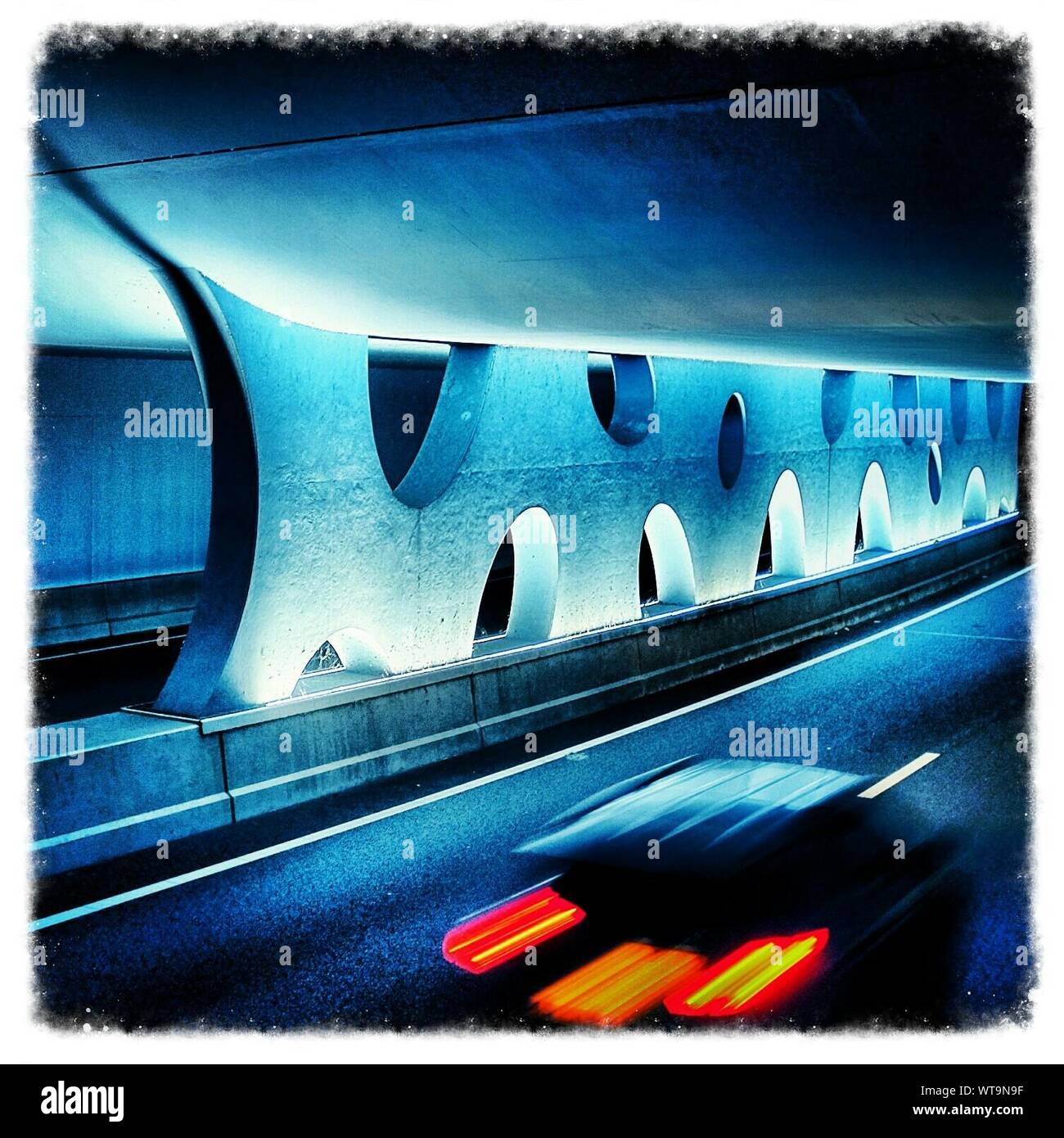 Car driving through tunnel Cut Out Stock Images & Pictures - Alamy