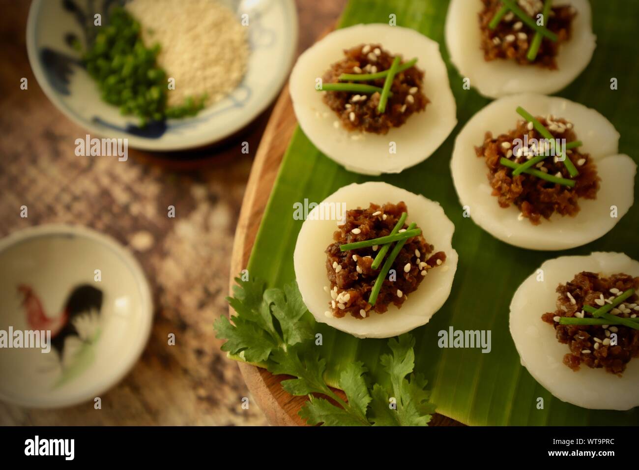Chwee Kueh. Vegetarian dish of steamed rice water cake with preserved ...