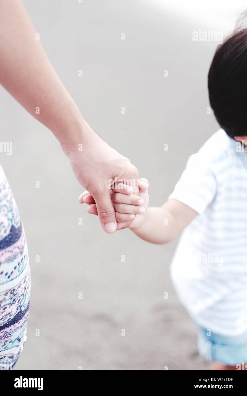 Mother holding the child hi-res stock photography and images - Alamy