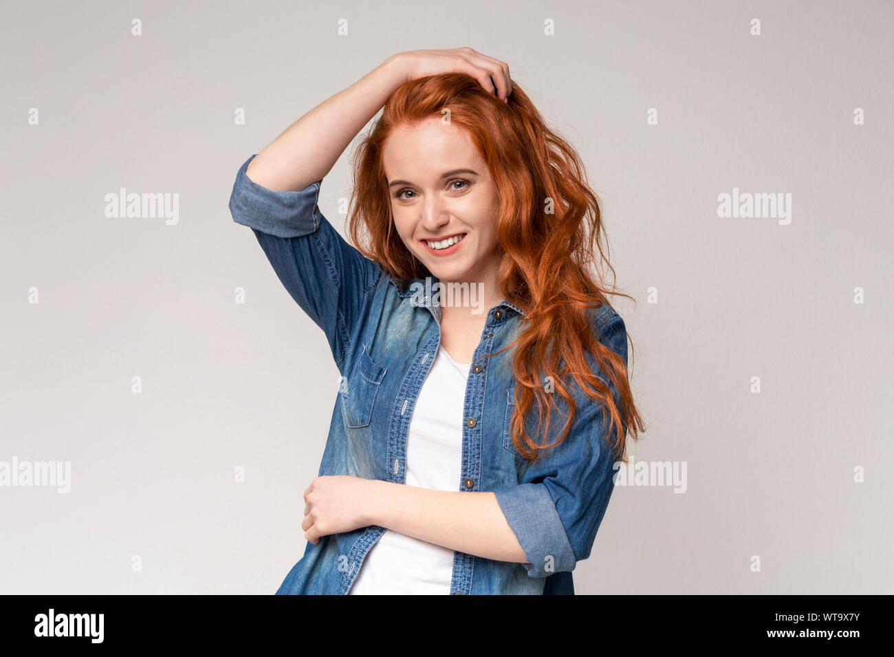 Timid smile hi-res stock photography and images - Alamy